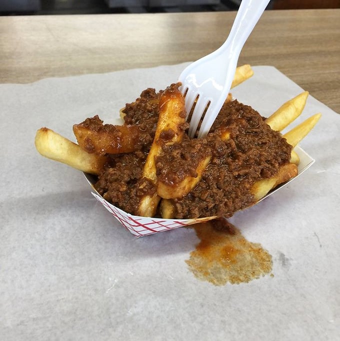 Chili cheese fries that make you forget your table manners—grab a fork or surrender to using your fingers, no judgment here.