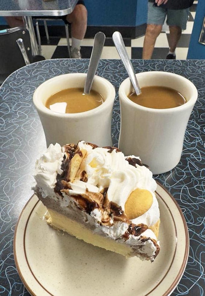 Pie and coffee: the dynamic duo of diner desserts. This chocolate banana cream slice isn't just a treat – it's the reason elastic waistbands were invented.