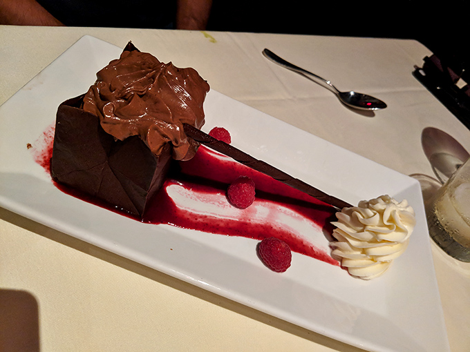 Chocolate cake that doesn't just satisfy your sweet tooth – it throws a party for it. Those raspberry accents add the perfect tart counterpoint.
