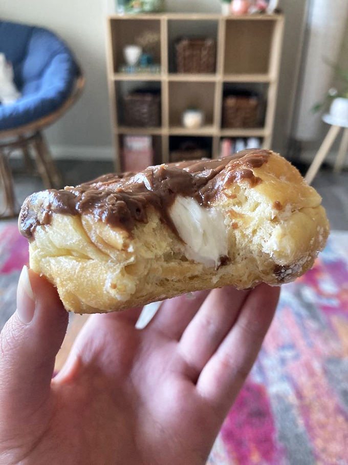 This cream-filled masterpiece reveals its secret treasure—like finding the surprise in a cereal box, except infinitely more delicious and worth the wait.