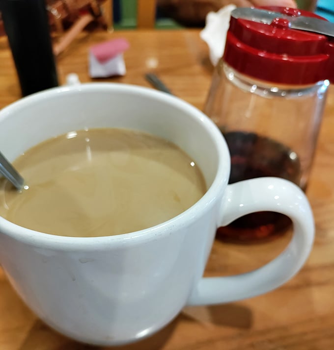 The elixir of morning people everywhere, served hot and often. This isn't just coffee – it's liquid motivation with unlimited refills.