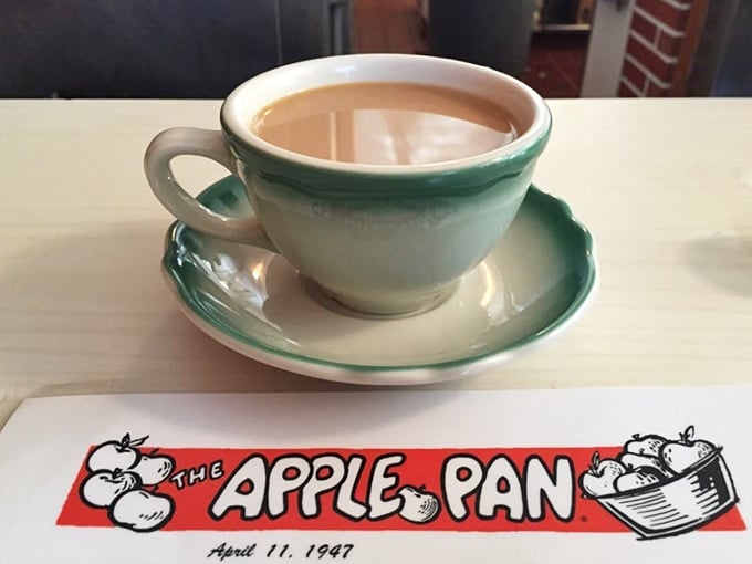 Coffee served in mint-green cups that have witnessed decades of conversations, celebrations, and first dates – strong enough to respect but not so strong it's showing off.