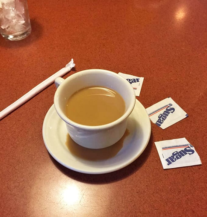 The humble coffee cup – breakfast's most loyal companion – stands ready for duty with its promise of caffeinated salvation.