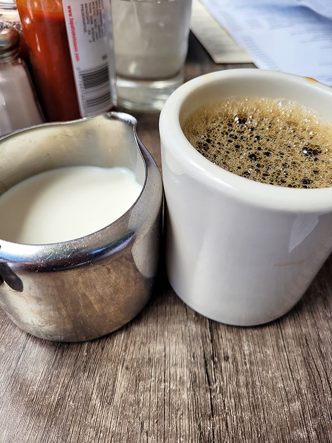 The simple pleasure of a diner coffee moment—where that first sip promises to transform you from zombie to functioning human being.