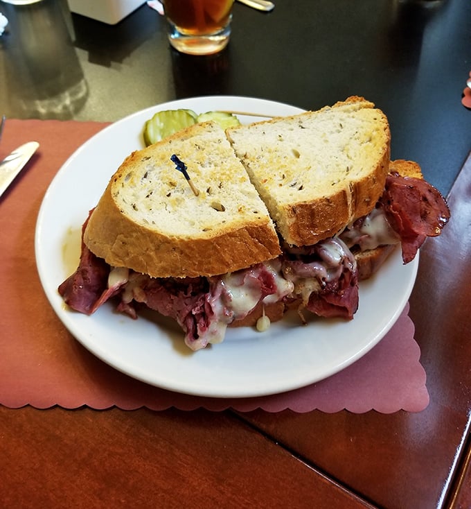 Behold the corned beef sandwich—meat stacked with such generosity it makes you wonder if they misunderstood the concept of profit margins.