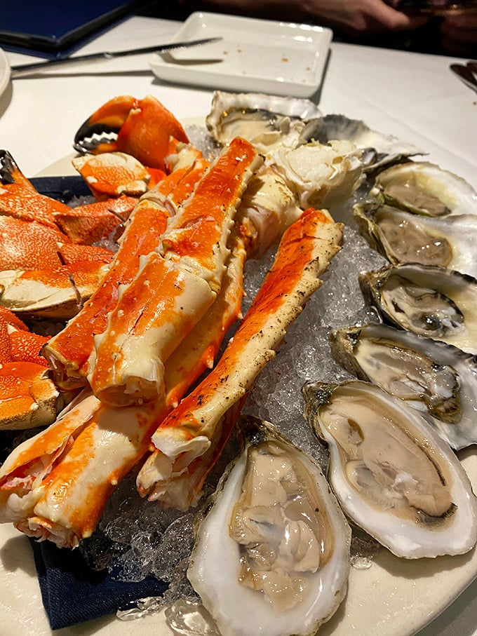The seafood tower that launched a thousand food envy glances. Those oysters and crab legs aren't just food—they're conversation pieces.