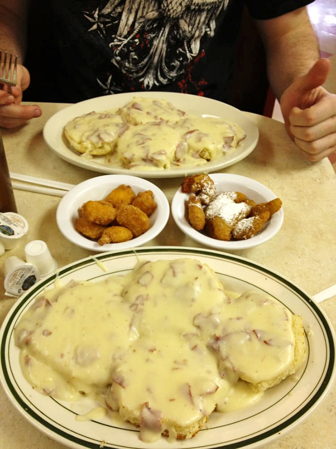 Biscuits smothered in creamy chipped beef gravy—the kind of breakfast that makes you want to take a nap and then come back for lunch.