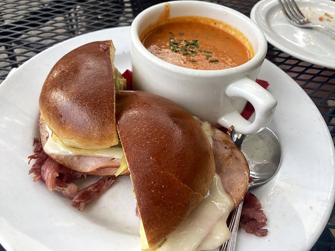 The Cuban sandwich and tomato soup combo—proof that some partnerships are simply meant to be, like Astaire and Rogers.