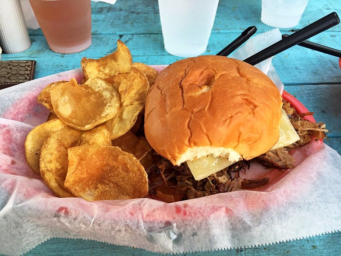 A pulled pork sandwich that doesn't need sauce to show off. Those house-made chips are the unsung heroes – crispy, salty perfection.