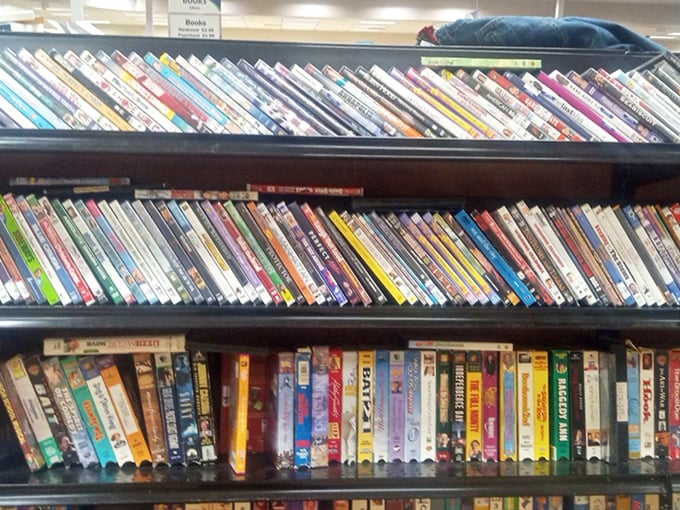 DVDs and books proving that physical media isn't dead—it just moved to Arkansas for a fresh start.