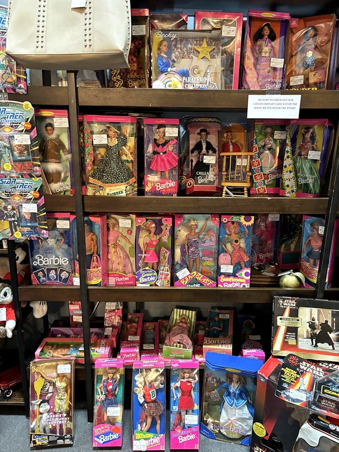 Barbie's historical timeline displayed in pristine packaging—from career woman to fashion icon, all without a single wrinkle.