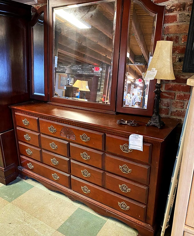 This mahogany dresser with mirror has witnessed decades of outfit decisions. Solid wood craftsmanship at particle board prices!