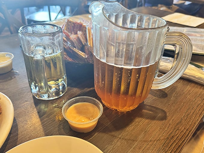 Sweet tea served by the pitcher – liquid Southern sunshine that makes everything taste better and conversations flow easier.