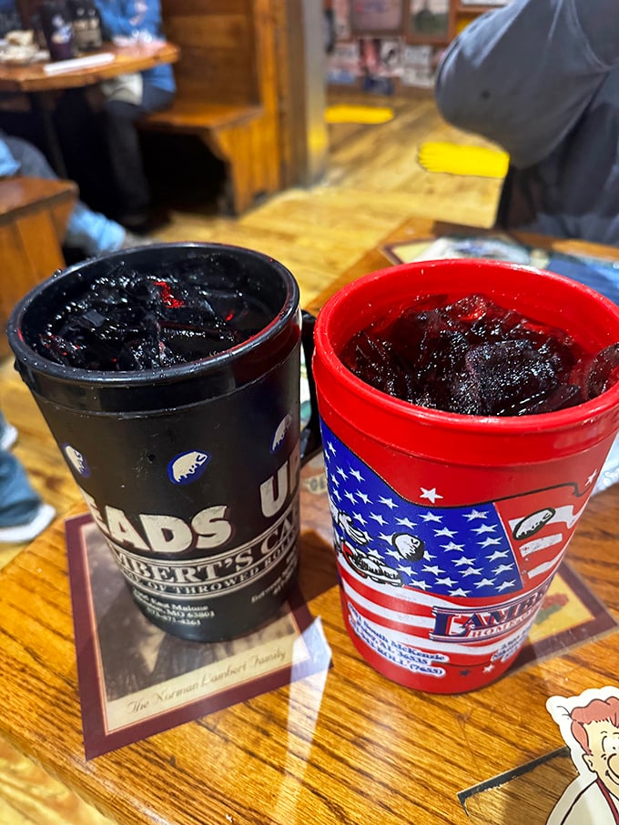 Lambert's signature cups aren't just vessels for sweet tea—they're souvenirs of a meal where "bottomless" isn't just a promise, it's a challenge.