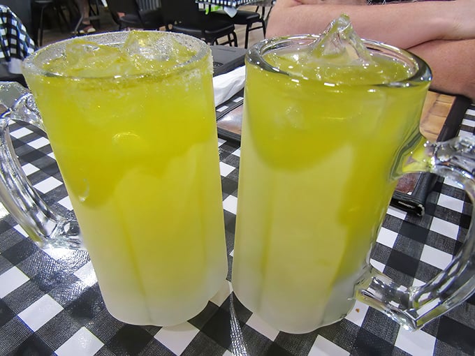 These frosty pitchers of lemonade aren't just drinks, they're liquid salvation in the Texas heat – tart, sweet, and utterly refreshing.