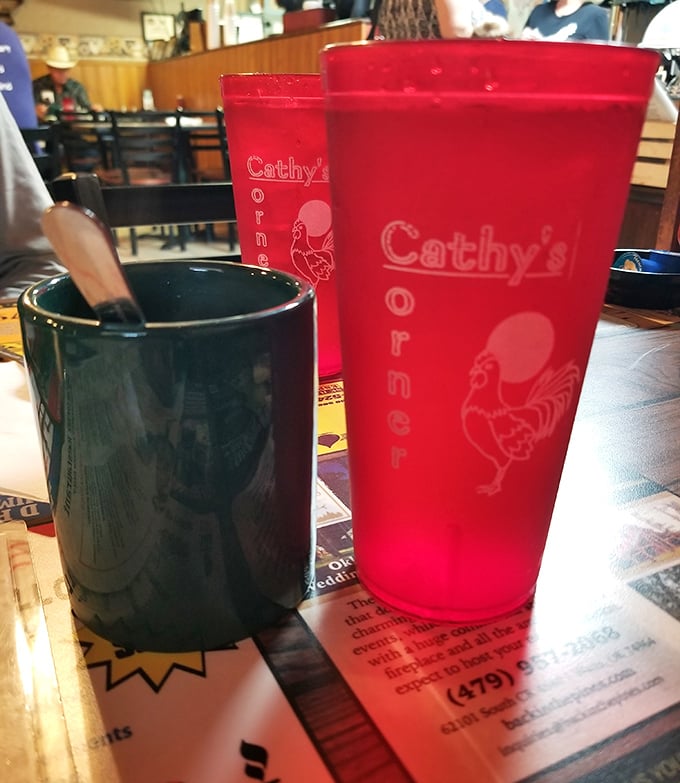 Those red plastic cups aren't just containers—they're a promise that refills will keep coming until you float away on a caffeinated cloud.
