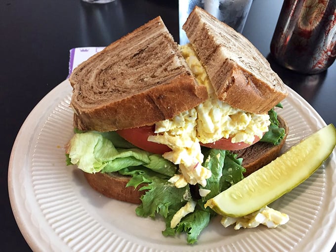 The egg salad sandwich on marble rye with crisp lettuce and juicy tomato proves that sometimes the classics need no improvement—just quality ingredients and care.