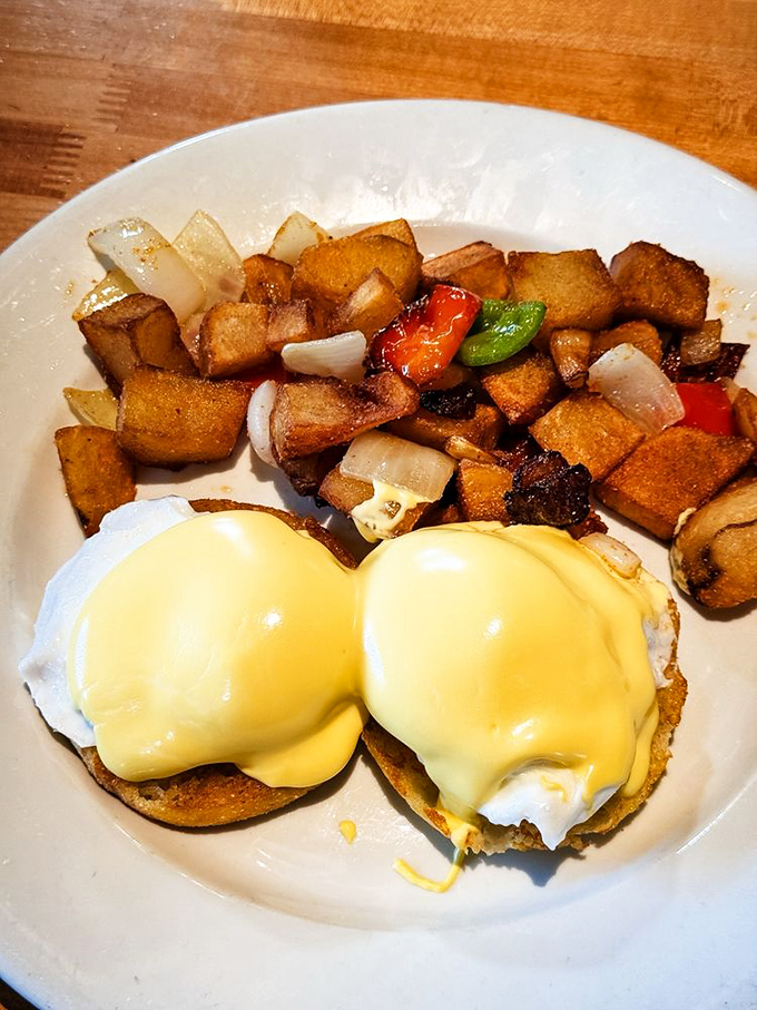 These Eggs Benedict aren't just breakfast—they're a morning masterpiece with hollandaise so perfect it could make a grown adult weep with joy.
