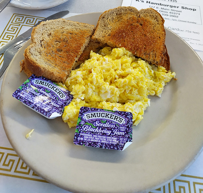 Scrambled eggs and toast – the breakfast equivalent of your favorite comfy sweater that never goes out of style.