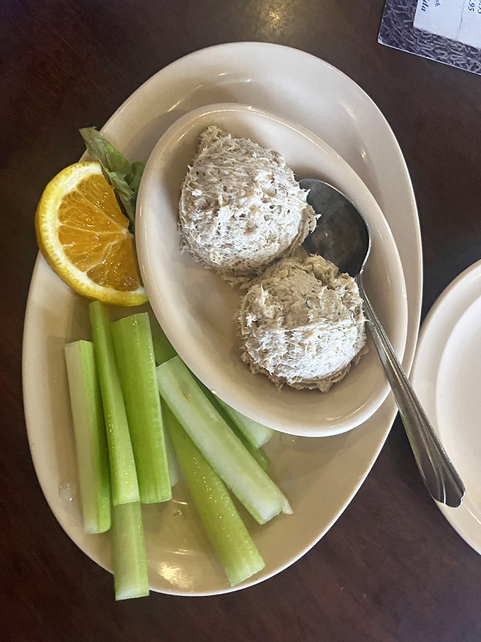 Fish dip with celery sticks and a citrus garnish—Florida's version of chips and salsa, only with significantly more maritime influence.