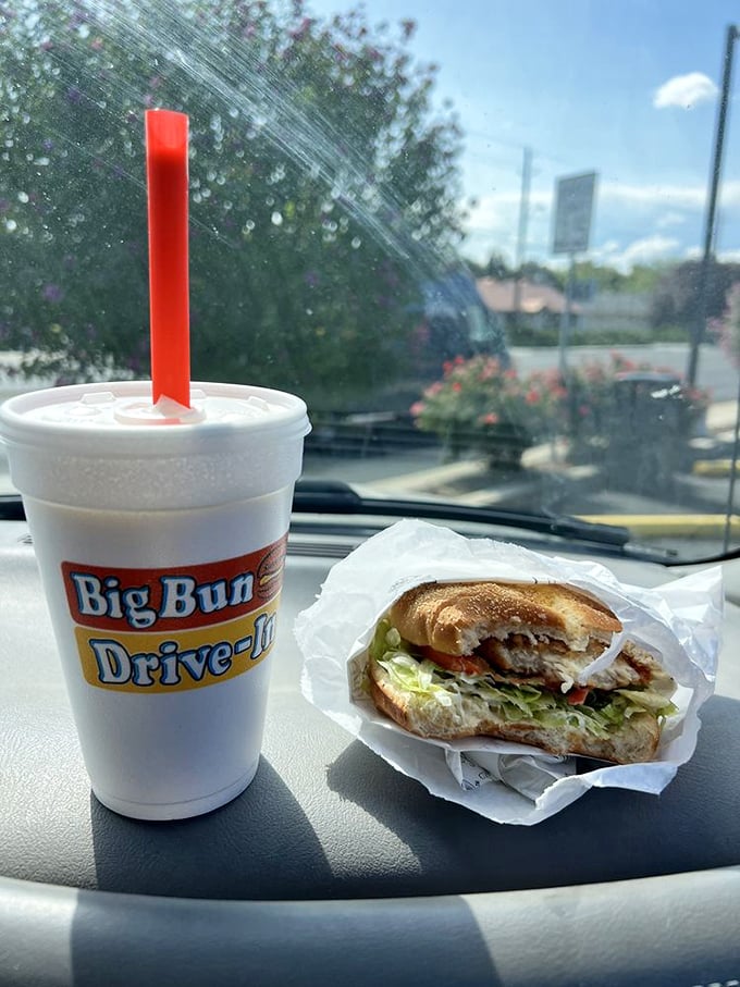 Car dining perfection: one hand on the wheel, one hand on your sandwich. It's the ultimate multitasking for those who understand life's true priorities. 