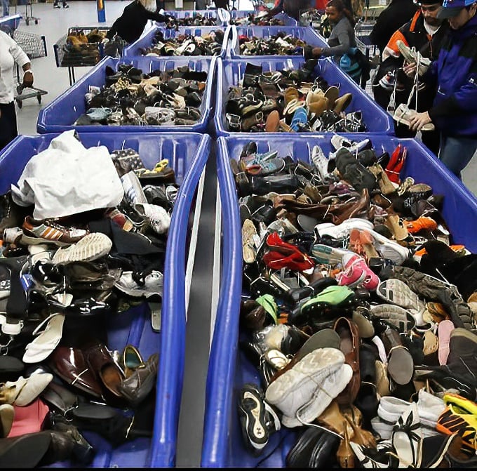 Shoe paradise or footwear free-for-all? These bins contain everything from barely-worn designer kicks to vintage boots waiting for their second act.