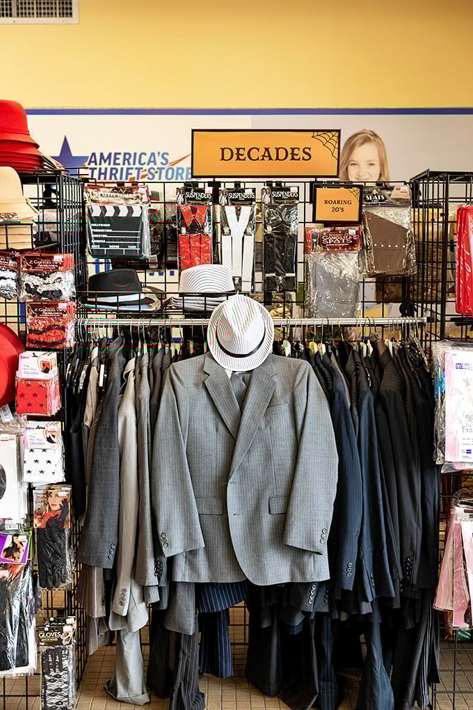 The "Decades" section transforms shopping into time travel, where vintage suits stand at attention, ready for their next Gatsby moment.