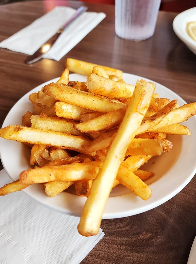 French fries that achieve the perfect balance between exterior crunch and interior fluff—the Goldilocks zone of fried potato perfection.