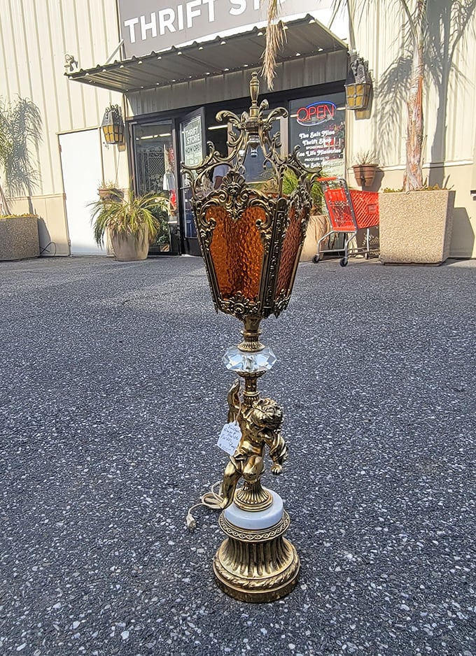 Not just a lamp—a conversation piece! This ornate cherub creation is what happens when baroque meets electricity with dramatic flair.