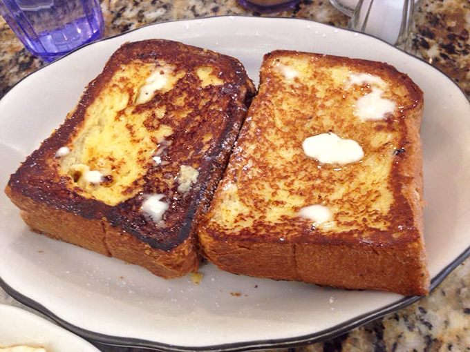 French toast that makes you question why anyone bothers with fancy brunch reservations. Thick-cut, golden, and waiting for that maple waterfall.