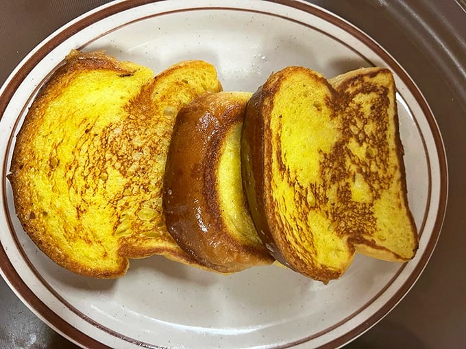 French toast that's achieved that magical golden-brown exterior while maintaining a custard-like center—the breakfast holy grail.