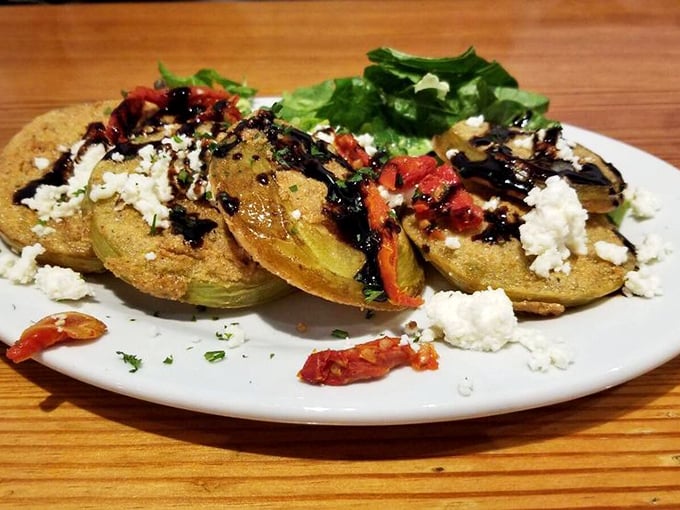 Fried green tomatoes topped with feta and balsamic – the Southern classic gets a Mediterranean makeover that works better than shoulder pads in the 80s.