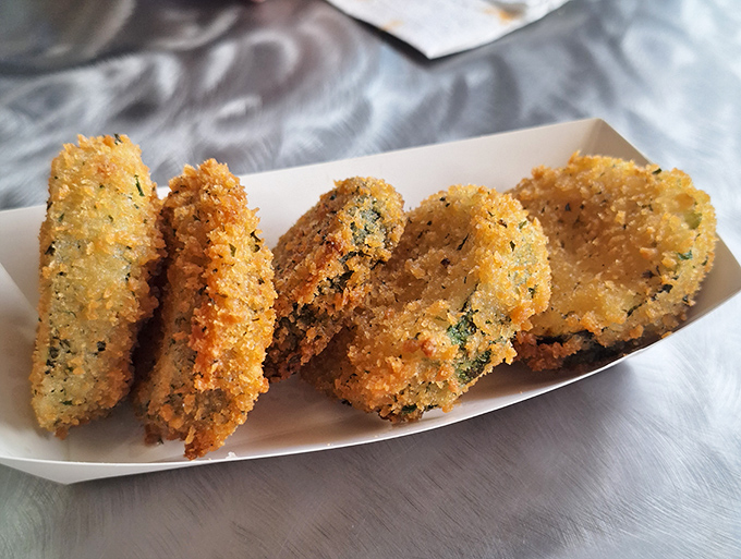 Golden-fried pickles with a perfect crunch – proof that sometimes the best things in life are battered and deep-fried.