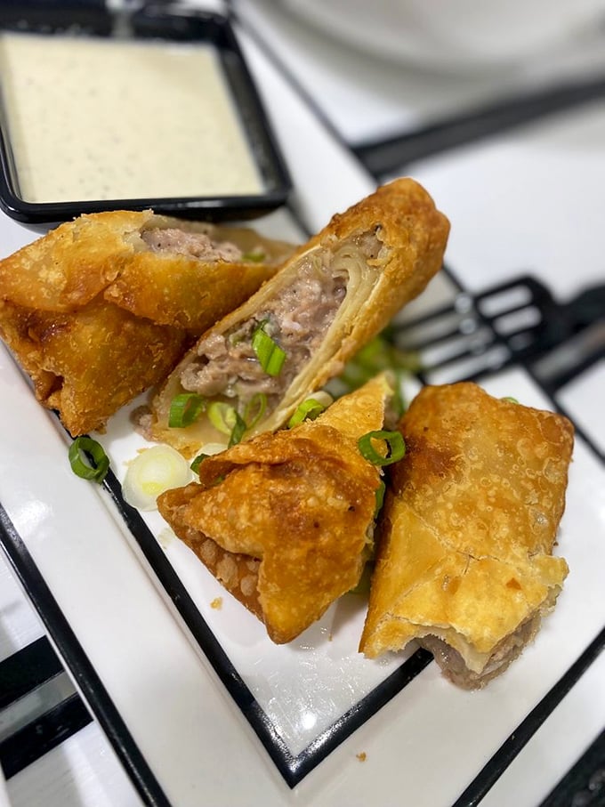 The humble egg roll, elevated to art form. Peek inside to find a savory treasure of seasoned pork that puts all mall food court versions to shame.