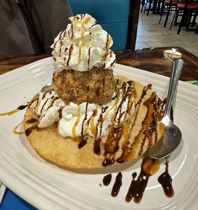 This isn't just dessert, it's a carnival on a plate – fried ice cream that somehow defies physics with its hot-cold magic trick.