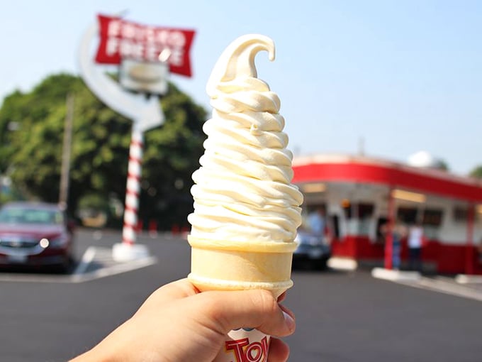 The soft-serve cone at Frisko Freeze doesn't need fancy mix-ins or artisanal toppings to transport you straight back to childhood summers.