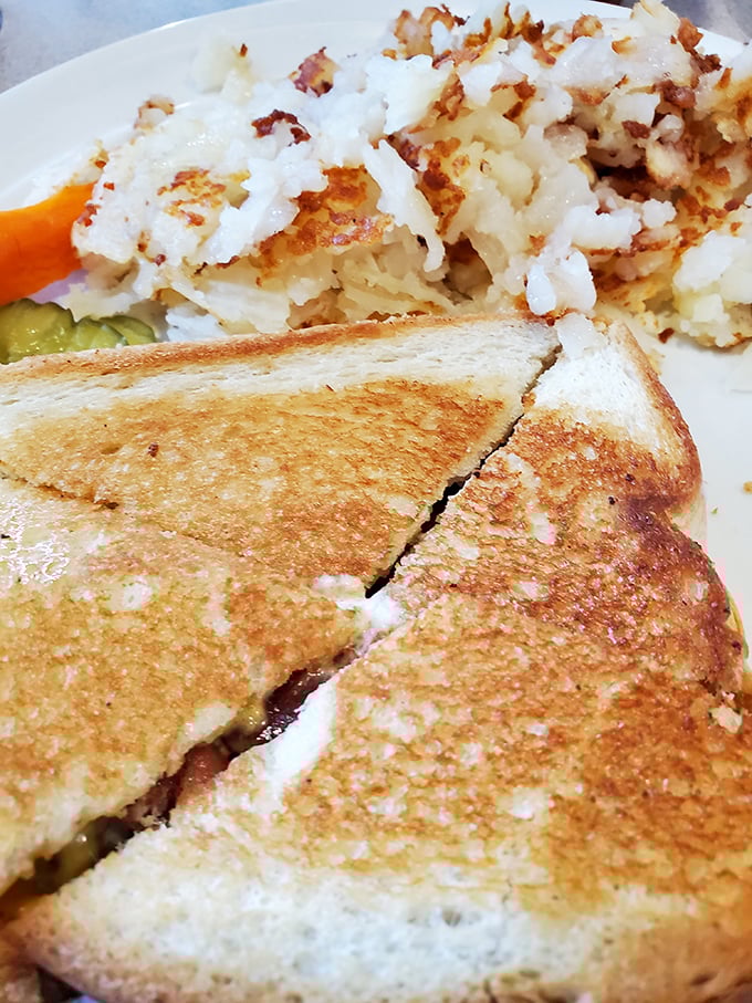 Grilled cheese and hash browns smothered in gravy—because sometimes simple comfort food is the most profound experience available.