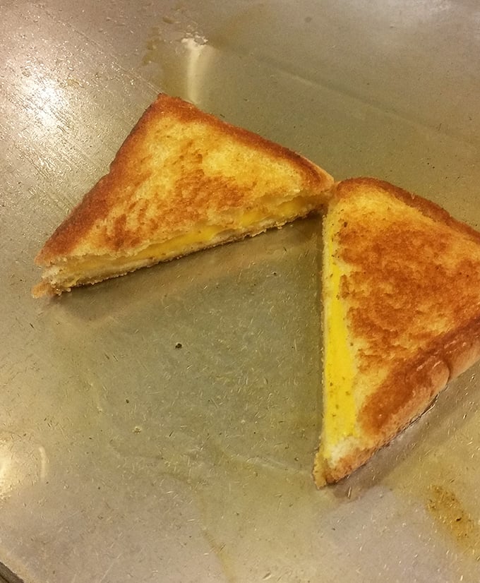 Golden-brown perfection - this grilled cheese isn't trying to reinvent the wheel, just remind you why the wheel was such a hit in the first place.