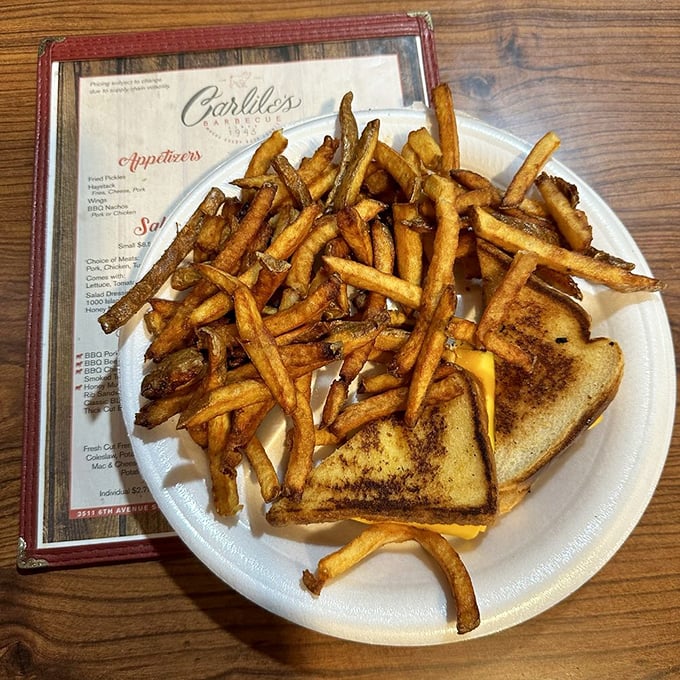 A grilled cheese that's had a heart-to-heart with some fresh-cut fries—comfort food that speaks the universal language of "everything's gonna be alright."
