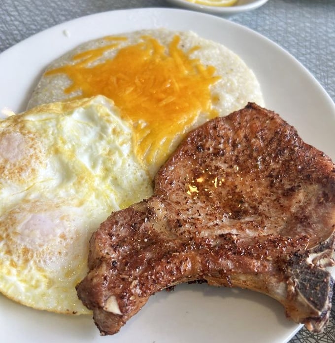 When a pork chop and eggs share a plate this harmoniously, it's like the breakfast equivalent of Lennon and McCartney—a collaboration that just works.