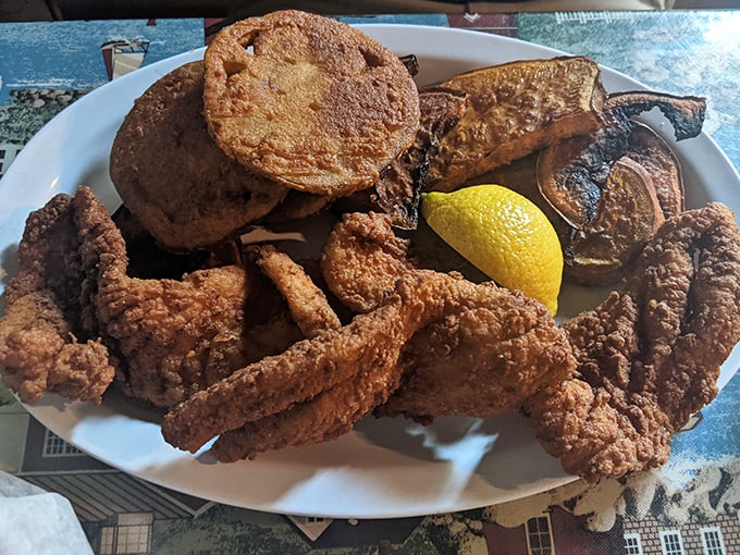 A seafood platter that doesn't mess around. That crispy coating protects the treasures within like a delicious suit of armor.