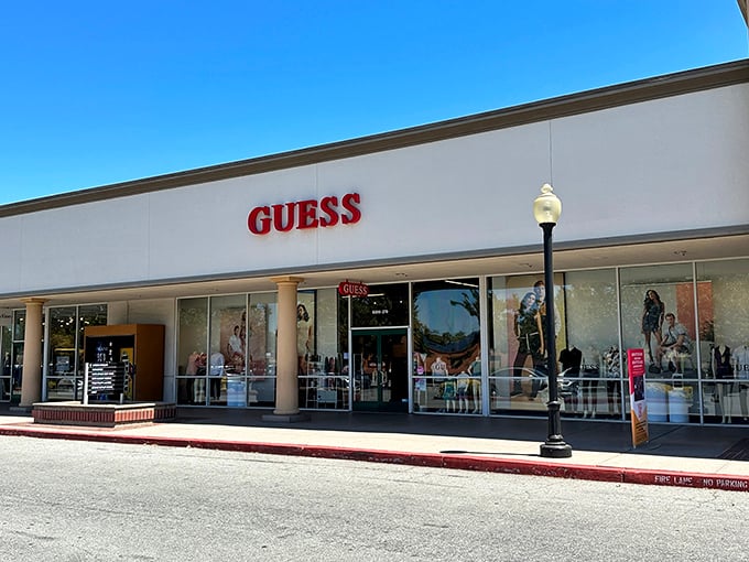 The clean lines and bright displays of Guess Factory beckon shoppers with denim dreams and logo aspirations.
