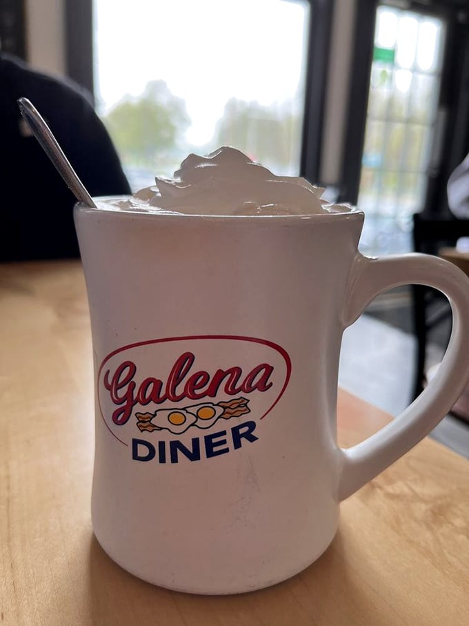 A whipped cream mountain tops this signature Galena Diner mug—hot chocolate elevated from childhood memory to grown-up indulgence.