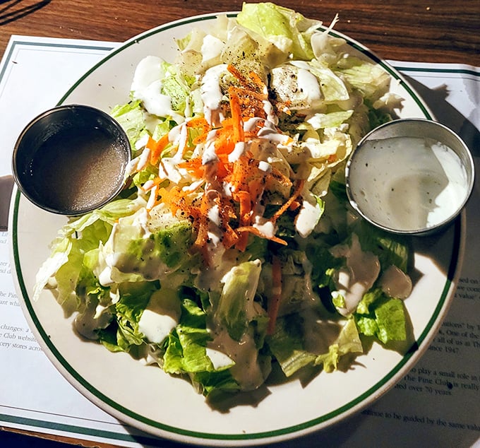 A house salad that actually deserves attention – crisp, colorful, and the perfect opening act before the meaty main event.