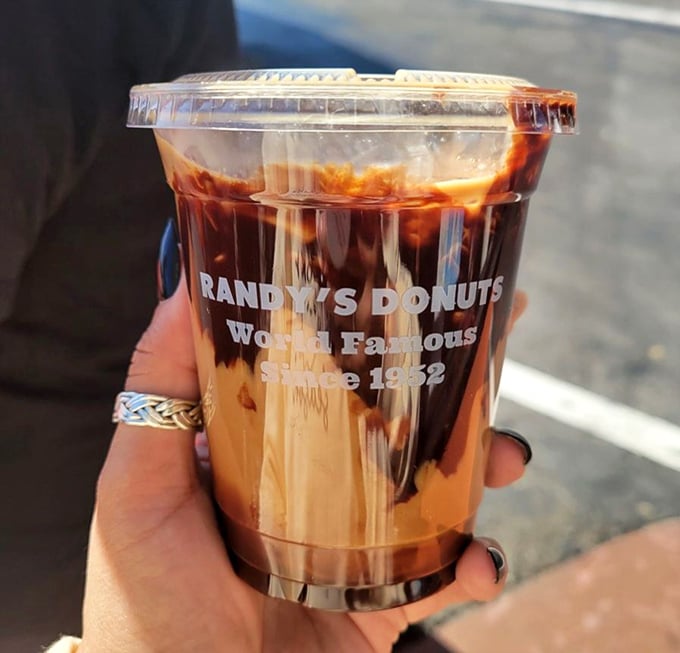 Their iced coffee comes branded with pride—because when you've been making donuts this good for decades, you've earned the right to brag a little.