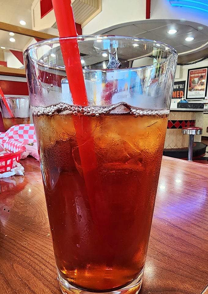 That iced tea – so perfectly amber and condensation-beaded – is the unsung hero of diner beverages, especially after a day in the Arizona sun.