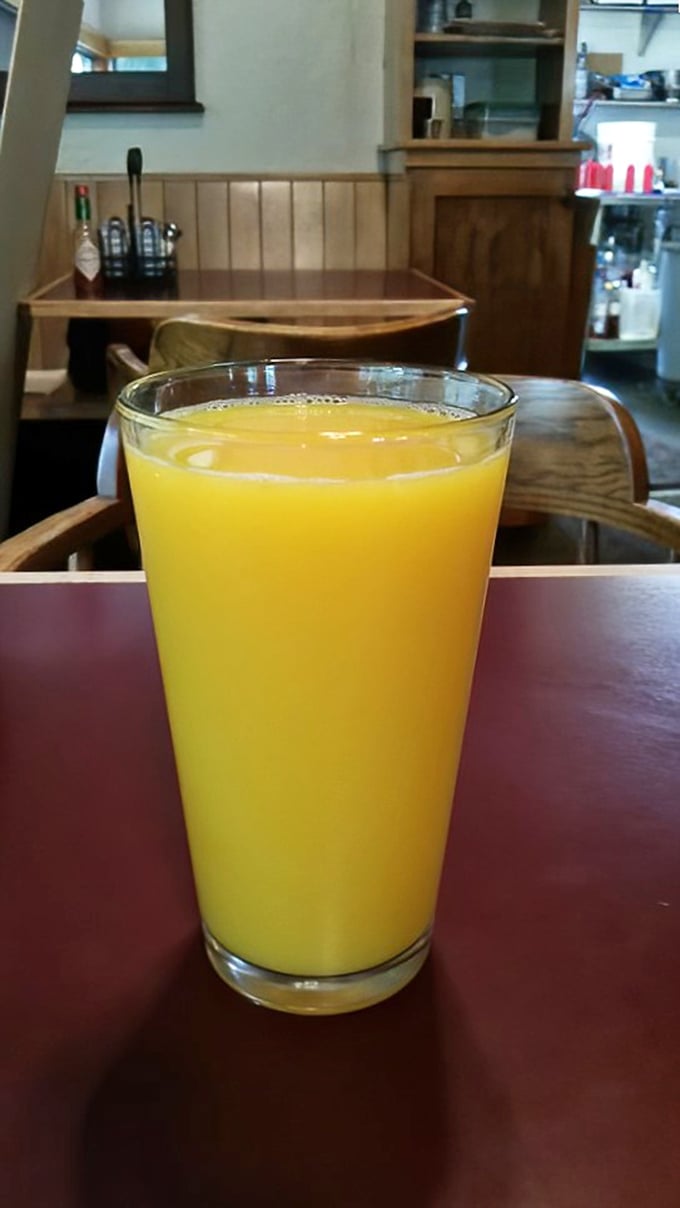 Fresh-squeezed orange juice that actually tastes like oranges—what a concept! The perfect bright companion to cut through those rich breakfast flavors.