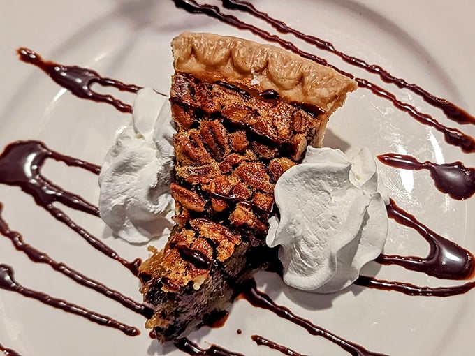 This pecan pie isn't just dessert—it's a sweet Southern symphony with a perfectly flaky crust and filling so rich it could probably buy a small country.