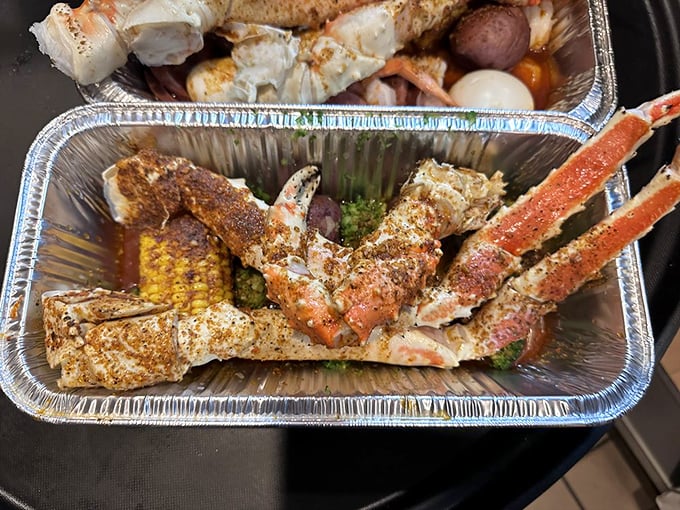 King crab legs and seasoned delights in their aluminum throne. Royalty doesn't always wear a crown—sometimes it wears Old Bay.