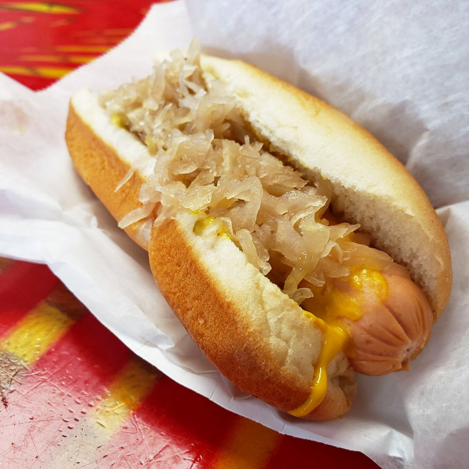 Sauerkraut lovers, meet your soulmate – this classic kraut dog delivers that perfect tangy crunch against a juicy, well-grilled all-beef frank today.